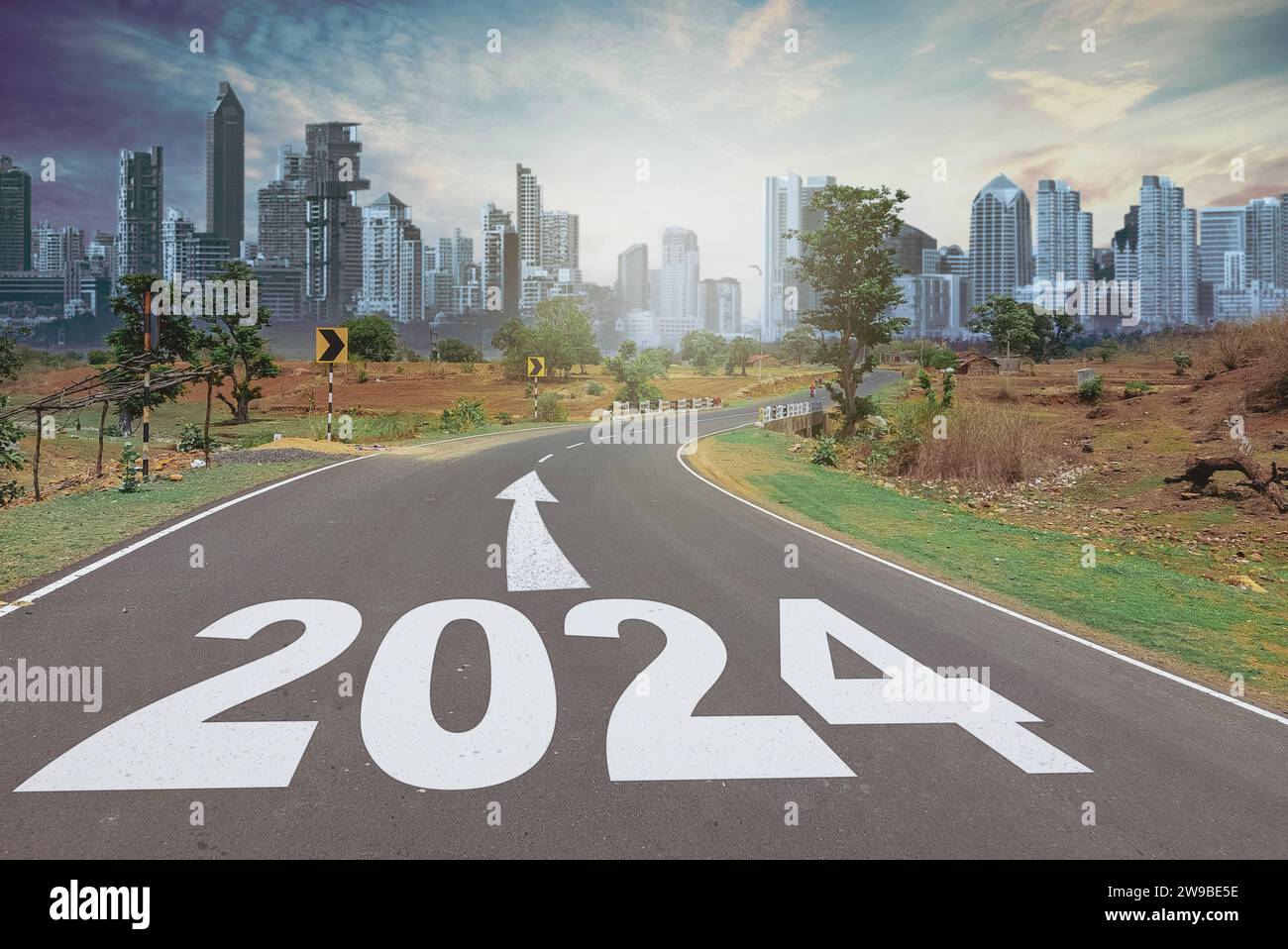 New year 2024 concept. Text 2024 written on the road in the middle of ...