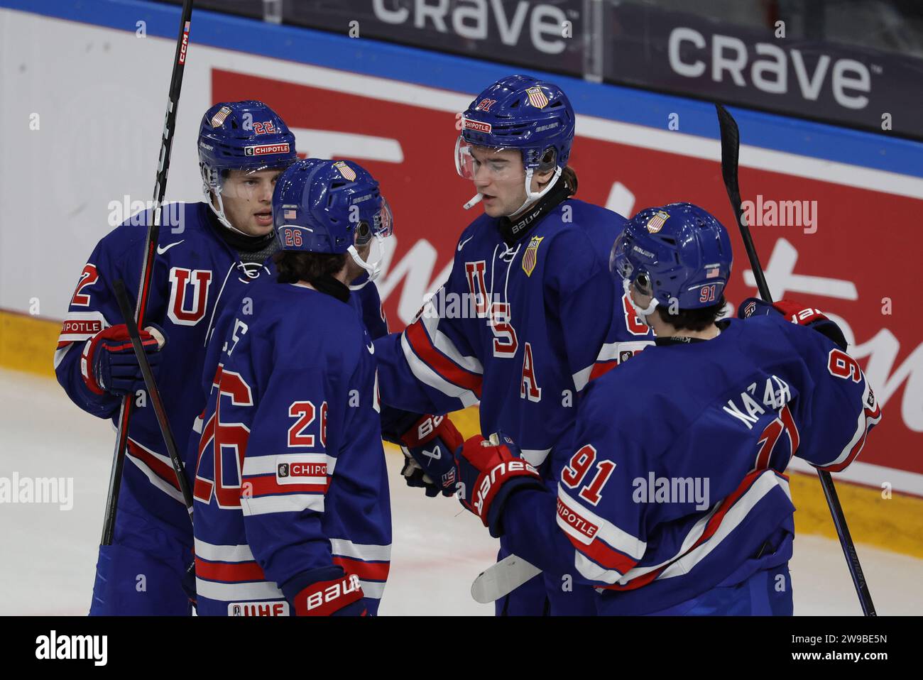 USA's Jimmy Snuggerud (in the middle) celebrates 1-0 with Seamus Casey ...