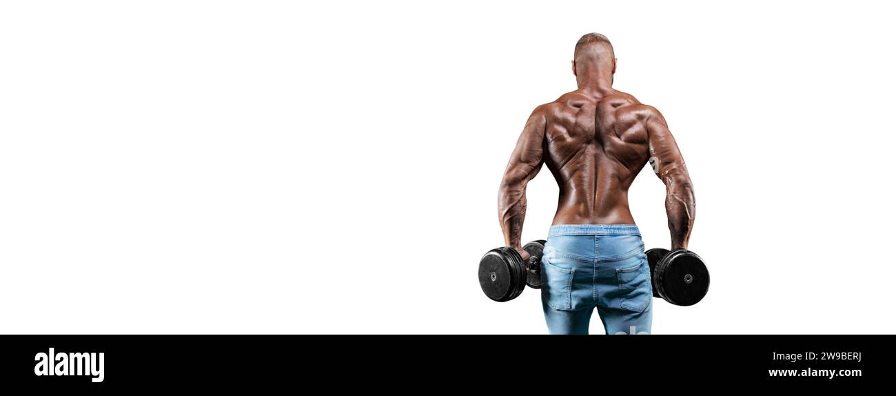 The athlete performs an exercise with dumbbells on a white background ...