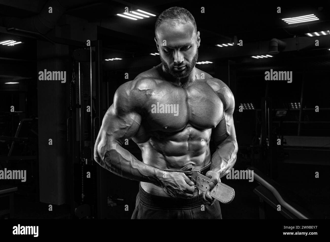 Male belly belt Black and White Stock Photos & Images - Alamy