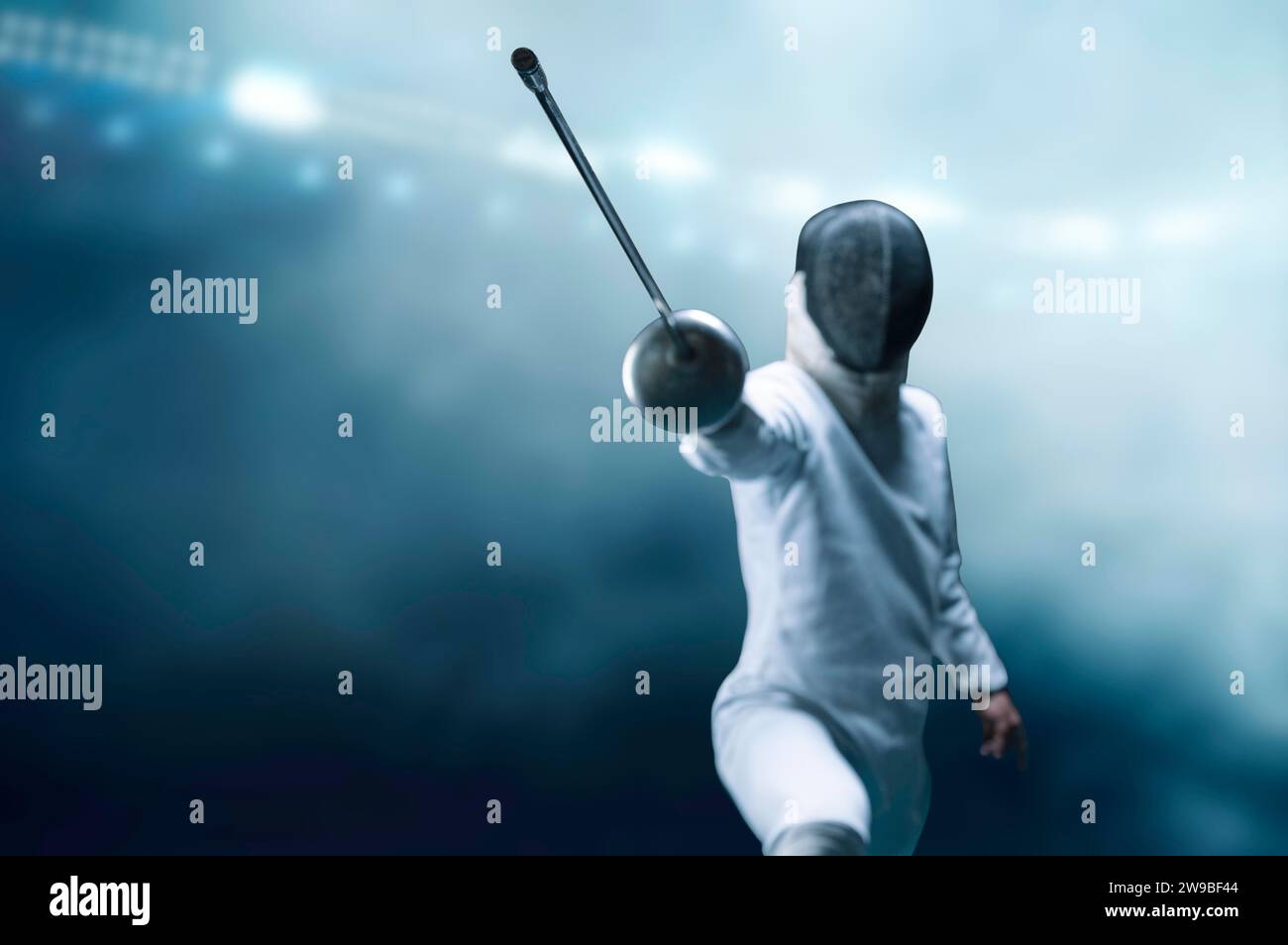 The fencer moves forward with a sword in his hand. Sport concept. Mixed ...
