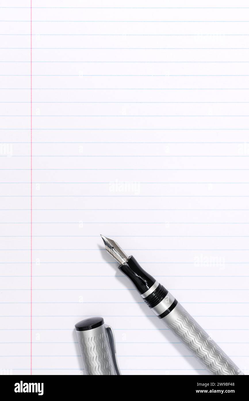 Fountain pen on blank lined paper background with Copy space Stock ...
