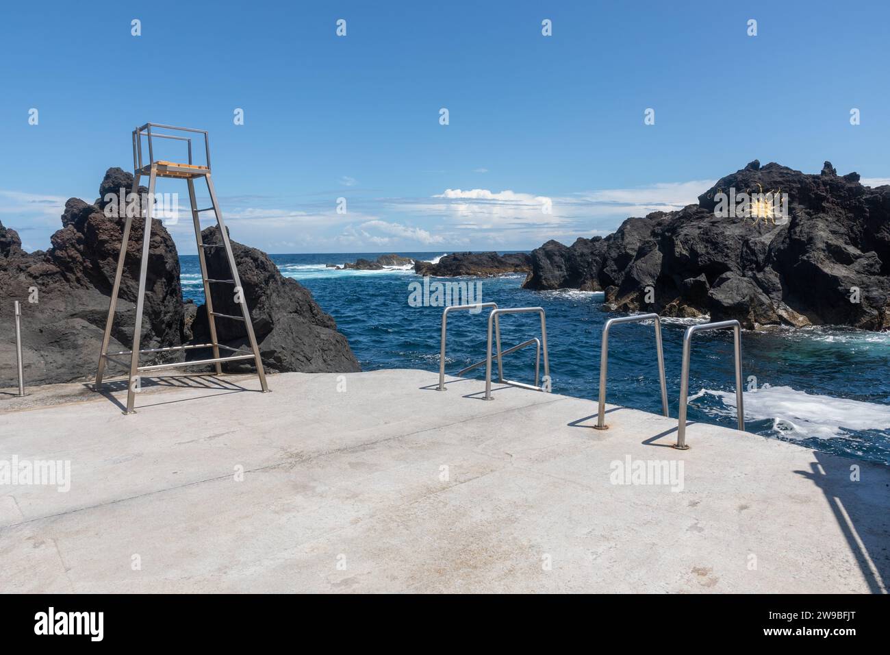 Outdoor swimming pool betwenn volcanic rocks on Terceira, Azores Stock ...