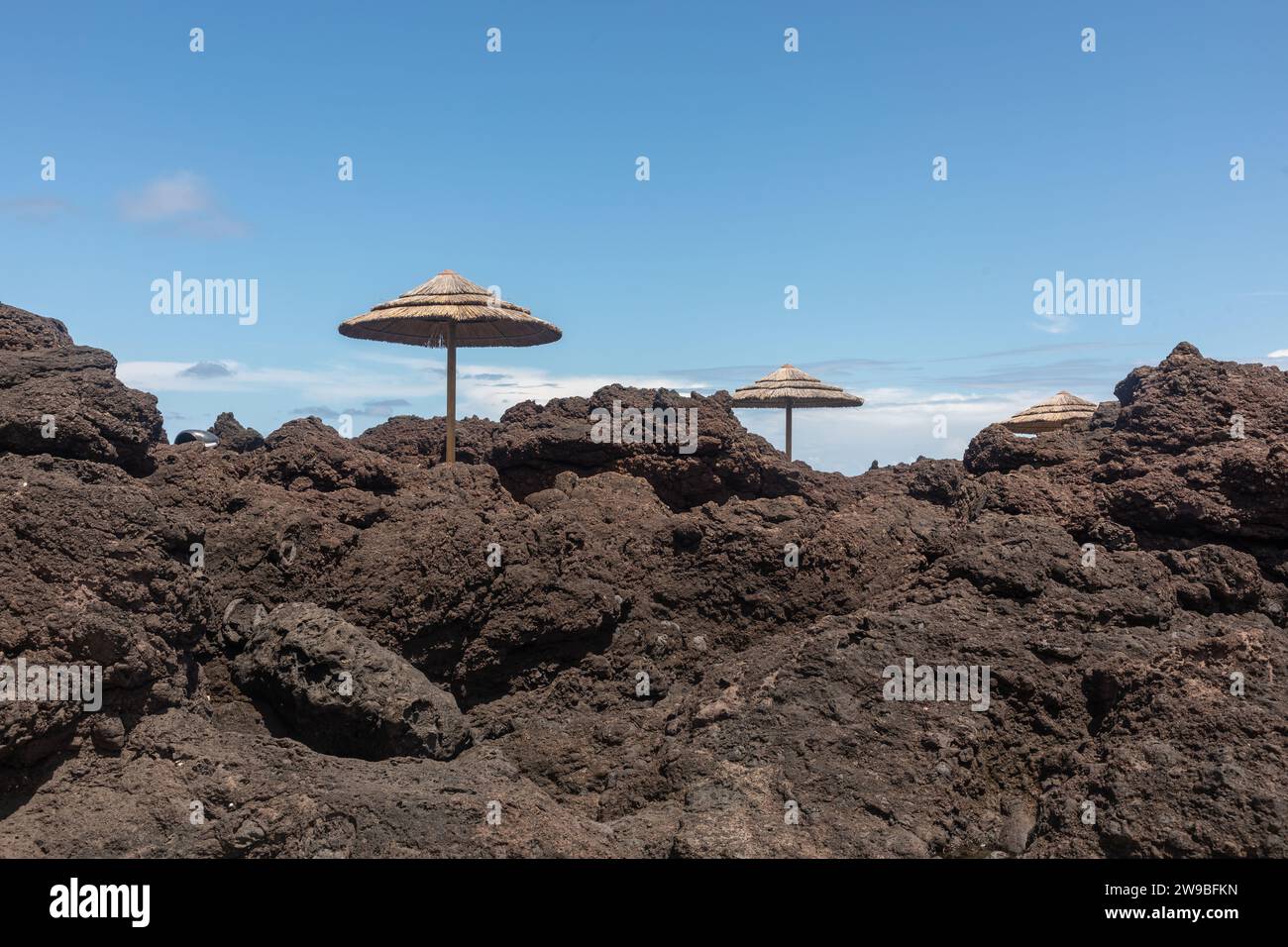 Outdoor swimming pool betwenn volcanic rocks on Terceira, Azores Stock ...