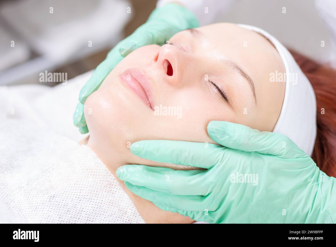 Beautiful girl gets face peeling. Skin health concept. Beauty salons ...