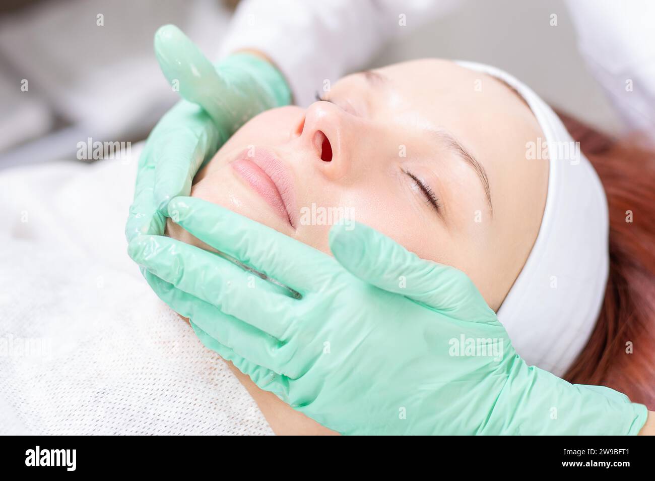 Beautiful girl gets face peeling. Skin health concept. Beauty salons ...