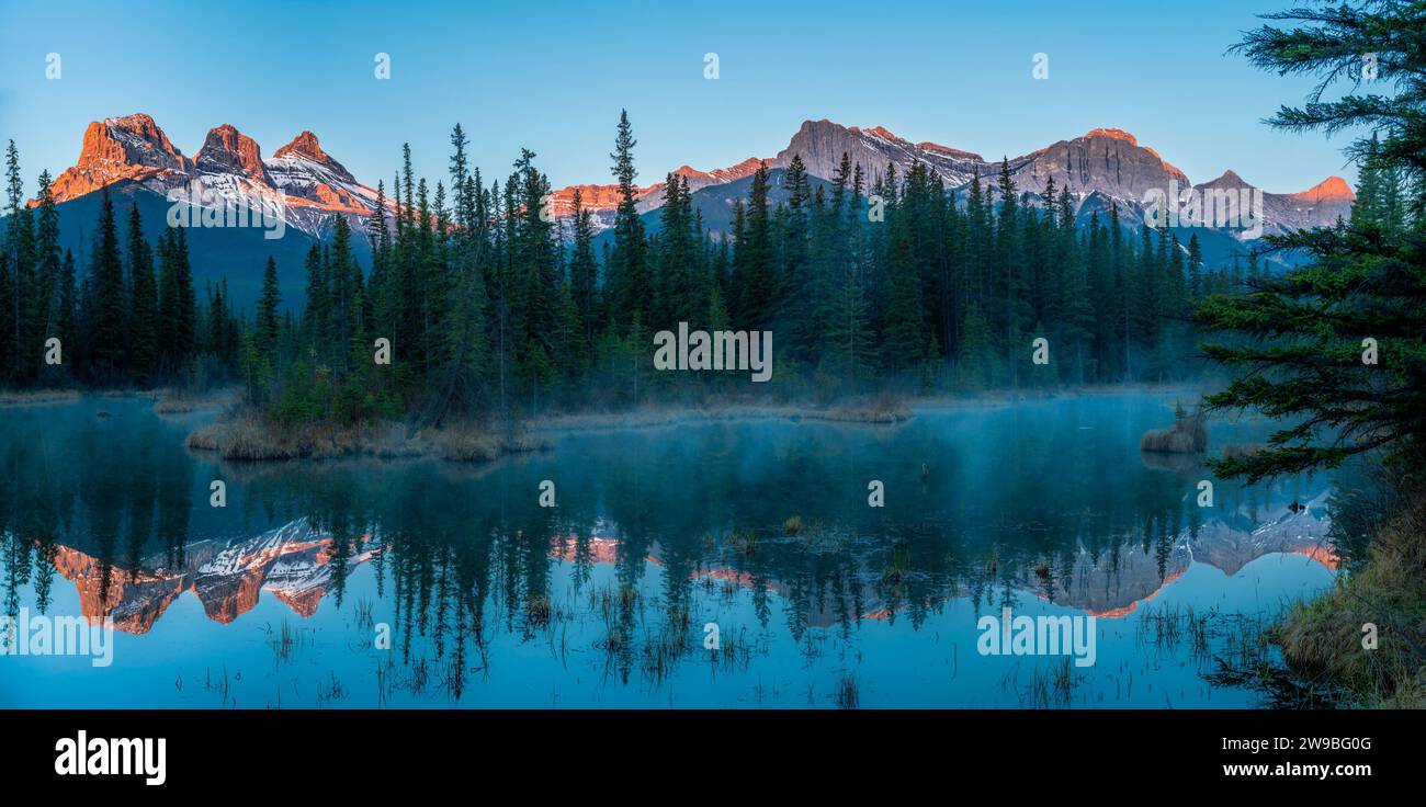 Lake with mountains in background, Three Sisters Mountain, Mount ...