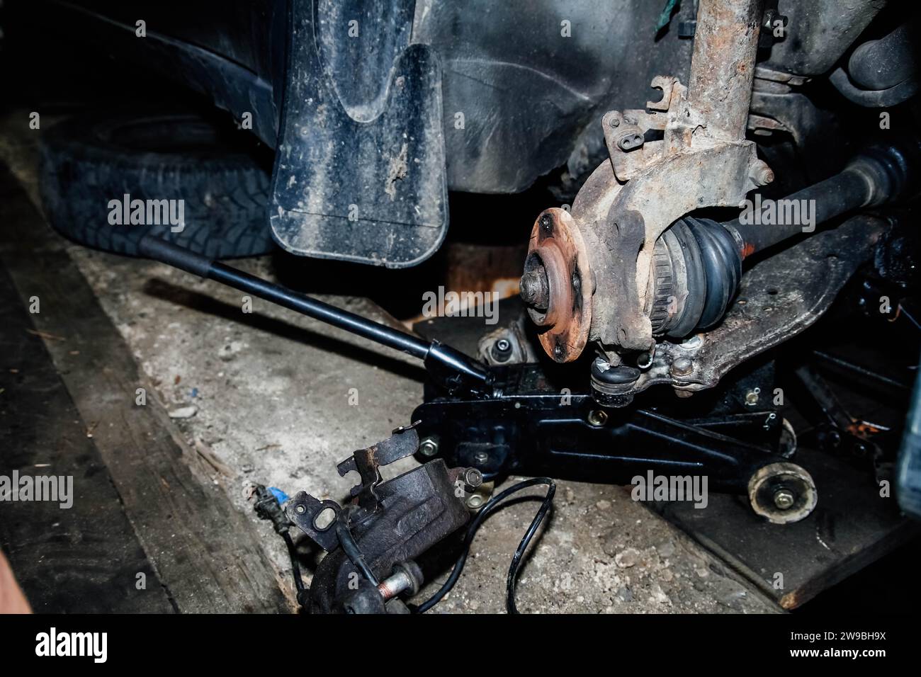 Car hub replacement, car repair, mechanic, glove, screws, motor ...