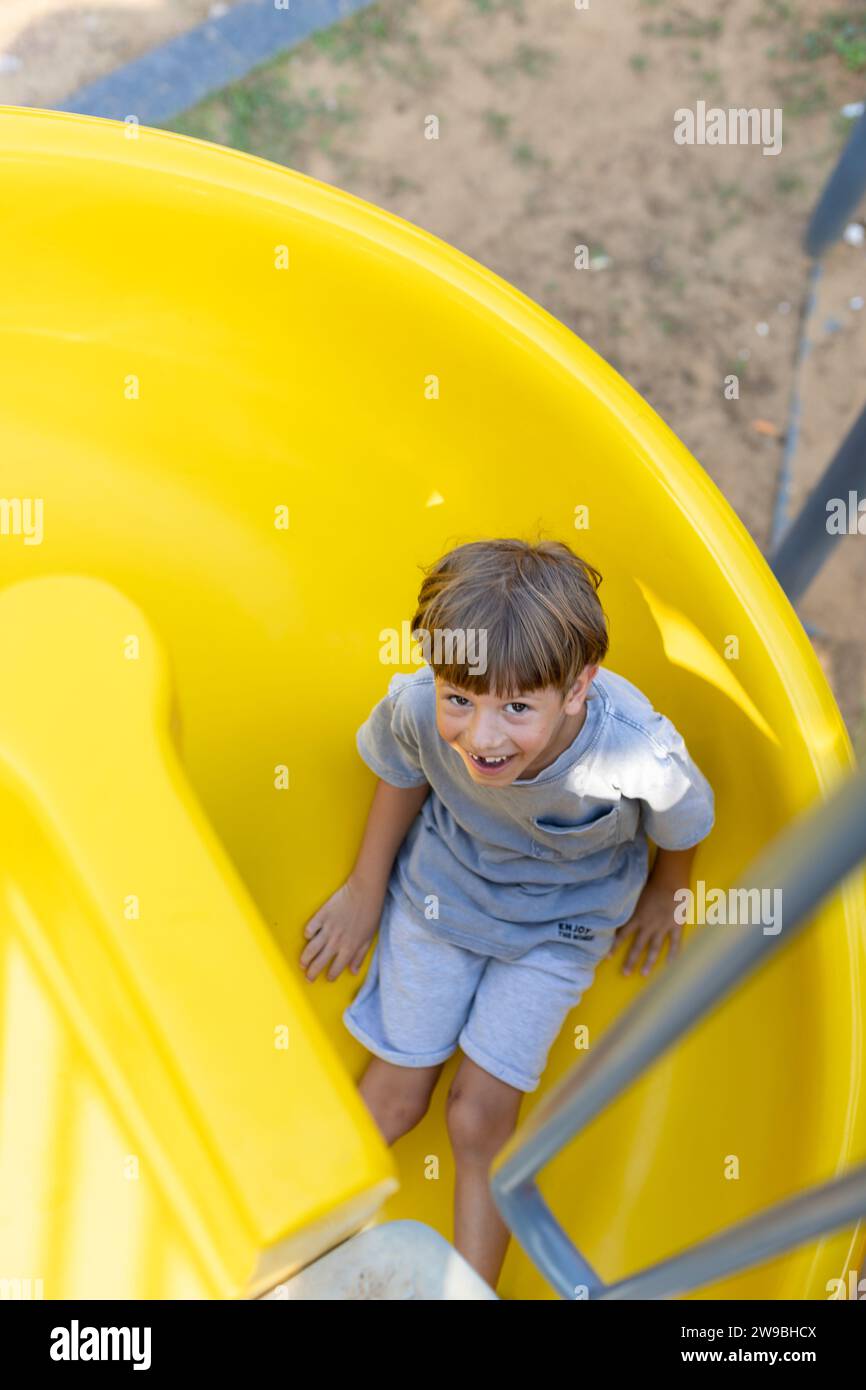 Positive emotions. View from above. Portrait of laughing happy boy ...