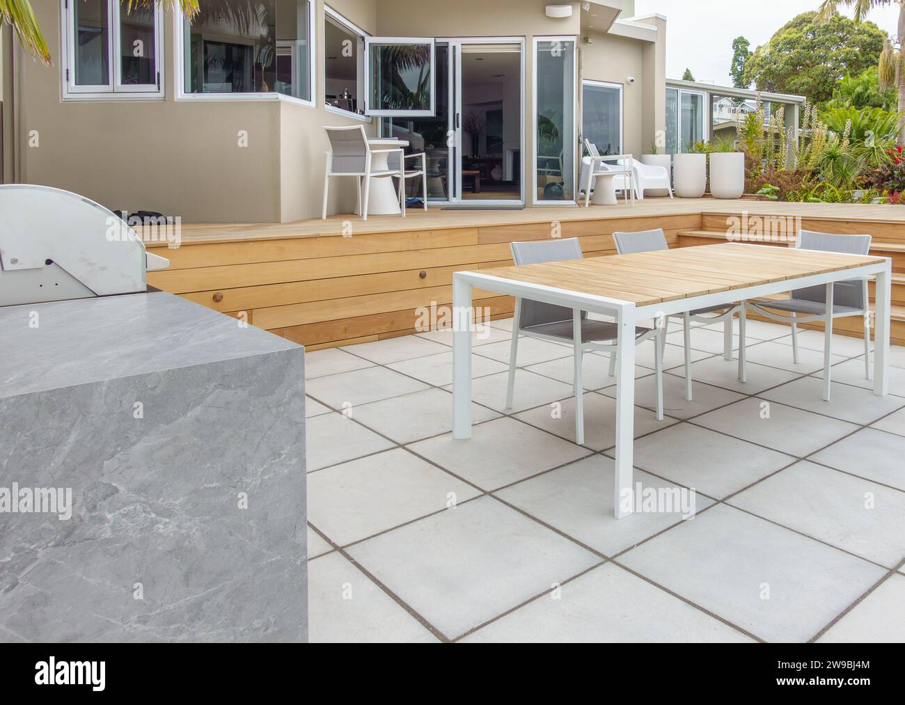 New outdoor deck and entertaining area design in wood and tiles with ...