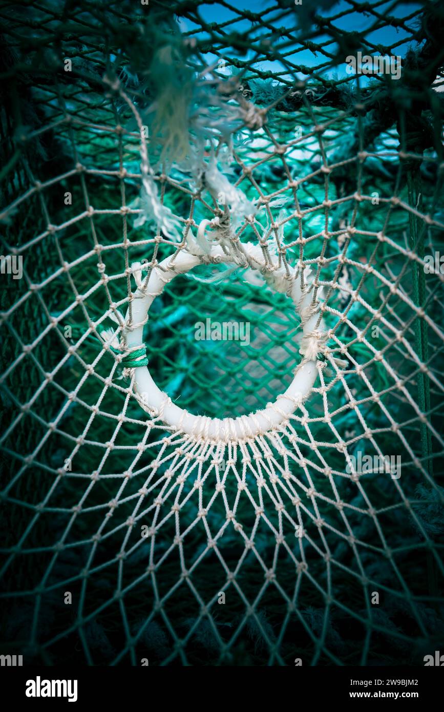 Close-up of nets, lines and threads of fish traps for catching crayfish ...