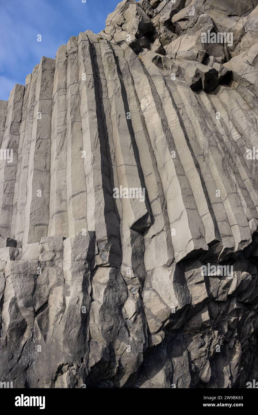 Detail of a mountain with a cave, located on a beach. Fascinating ...