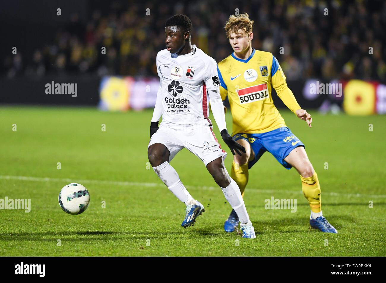 Westerlo, Belgium. 26th Dec, 2023. Rwdm's Pathe Mboup and Westerlo's ...