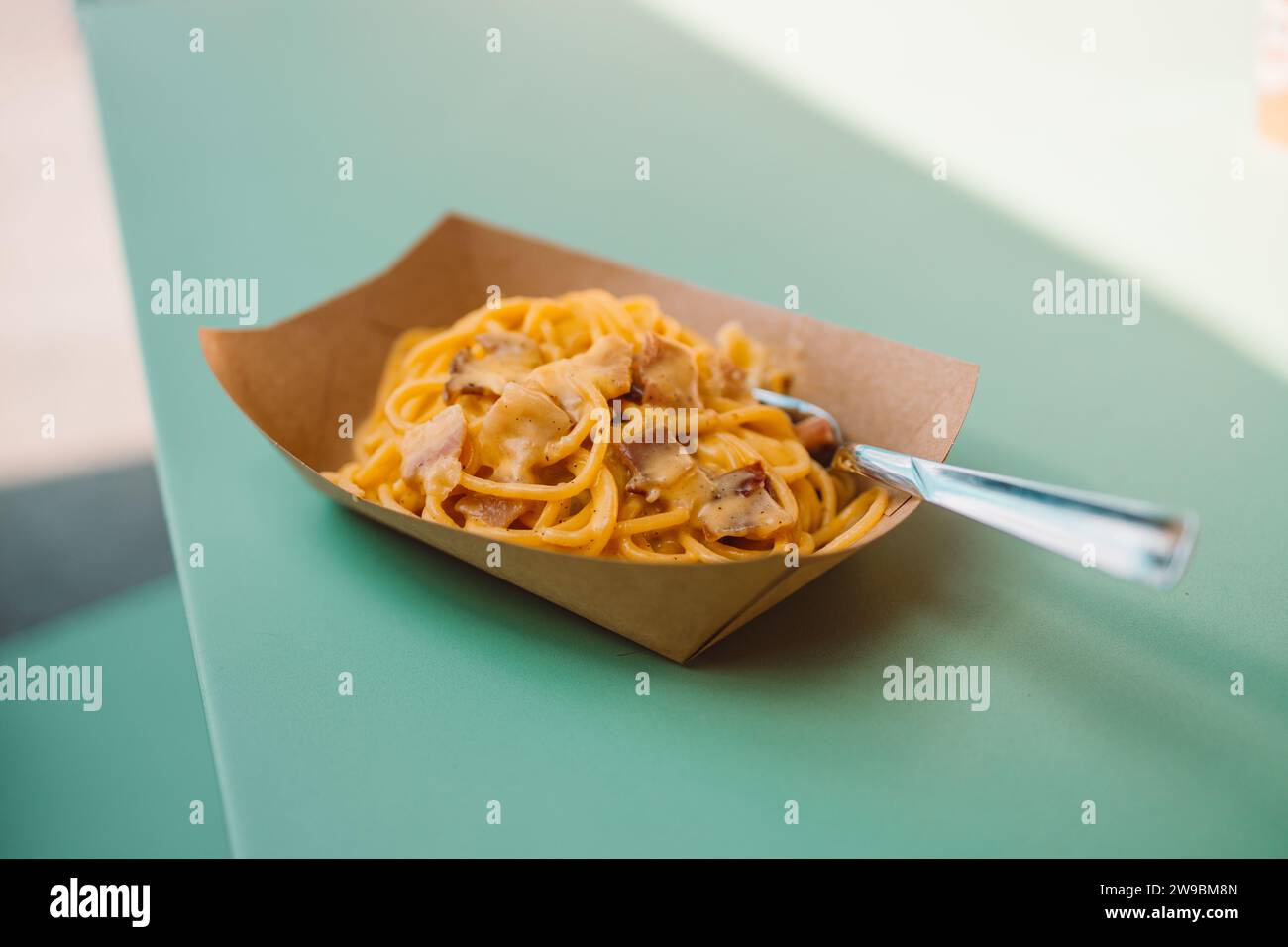 Traditional Italian fresh made colorful organic pasta carbonara on a ...