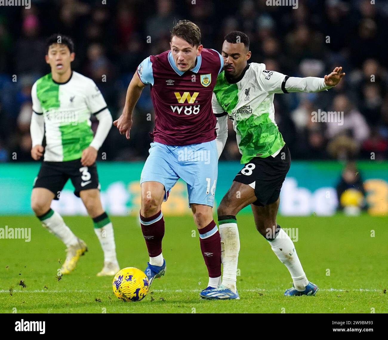 Burnley's Sander Berge (left) and Liverpool's Ryan Gravenberch battle ...