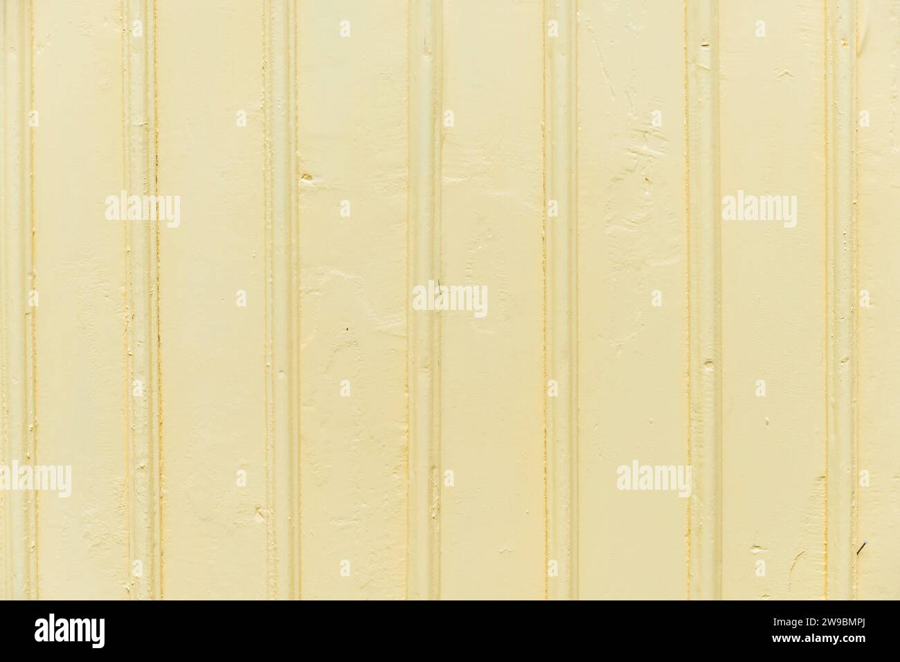 Light yellow painted boards of a wooden facade of a typical Swedish ...