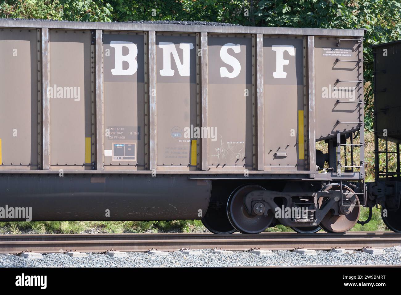 Everett, WA, USA - September 6, 2023; Loaded BNSF coal wagon with ...