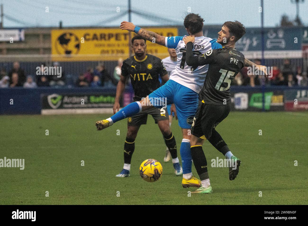 Barrow's Dom Telford battles with Stockport County's Ethan Pye during ...