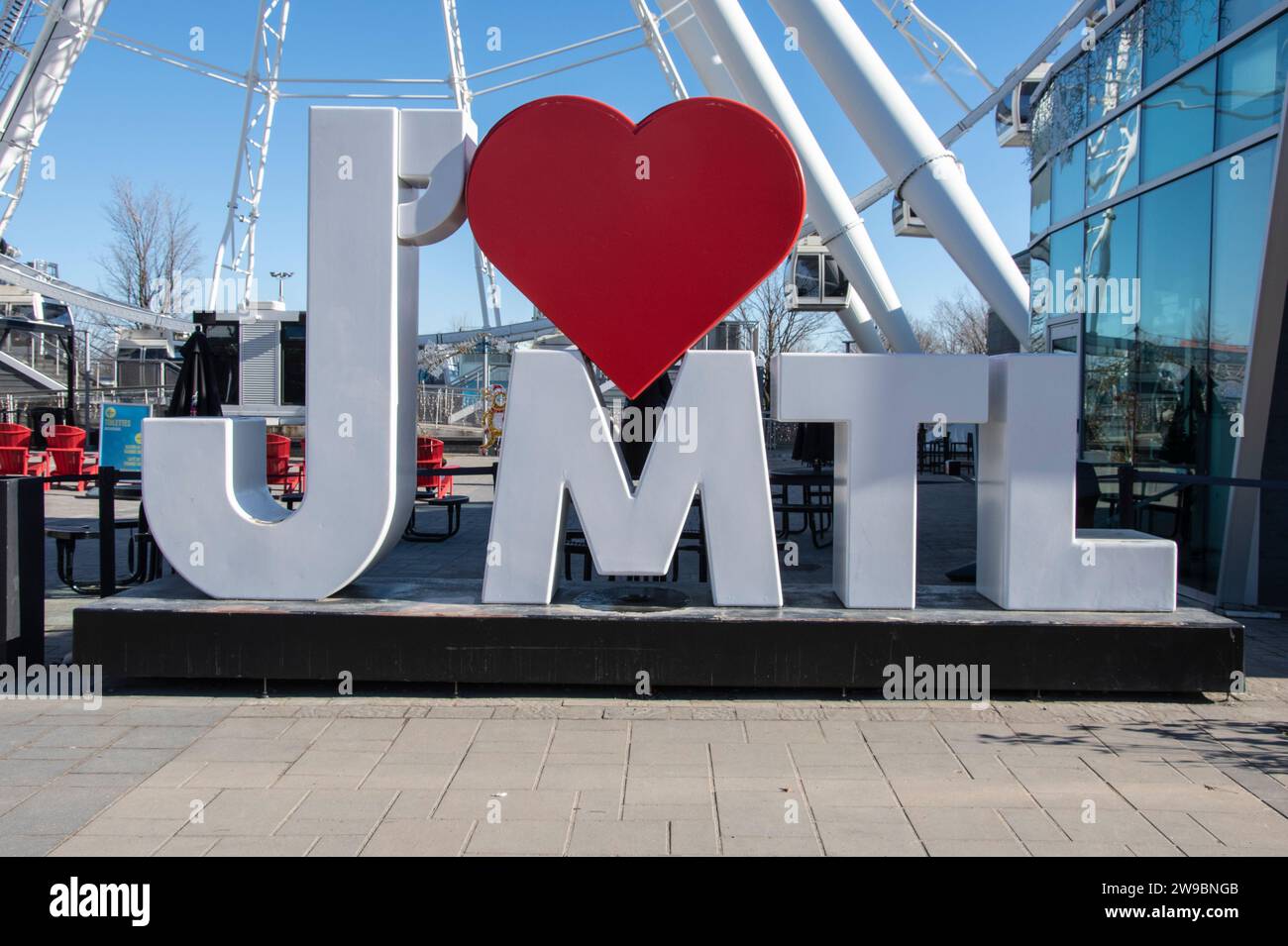 I heart MTL sign beside La Grande Roue ferris wheel in vieux Montreal ...
