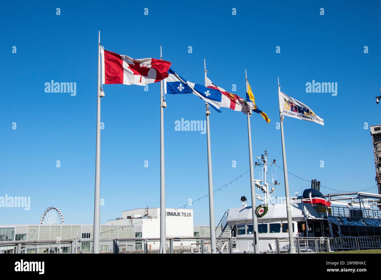 Flags flying at vieux Montreal, Quebec, Canada Stock Photo - Alamy