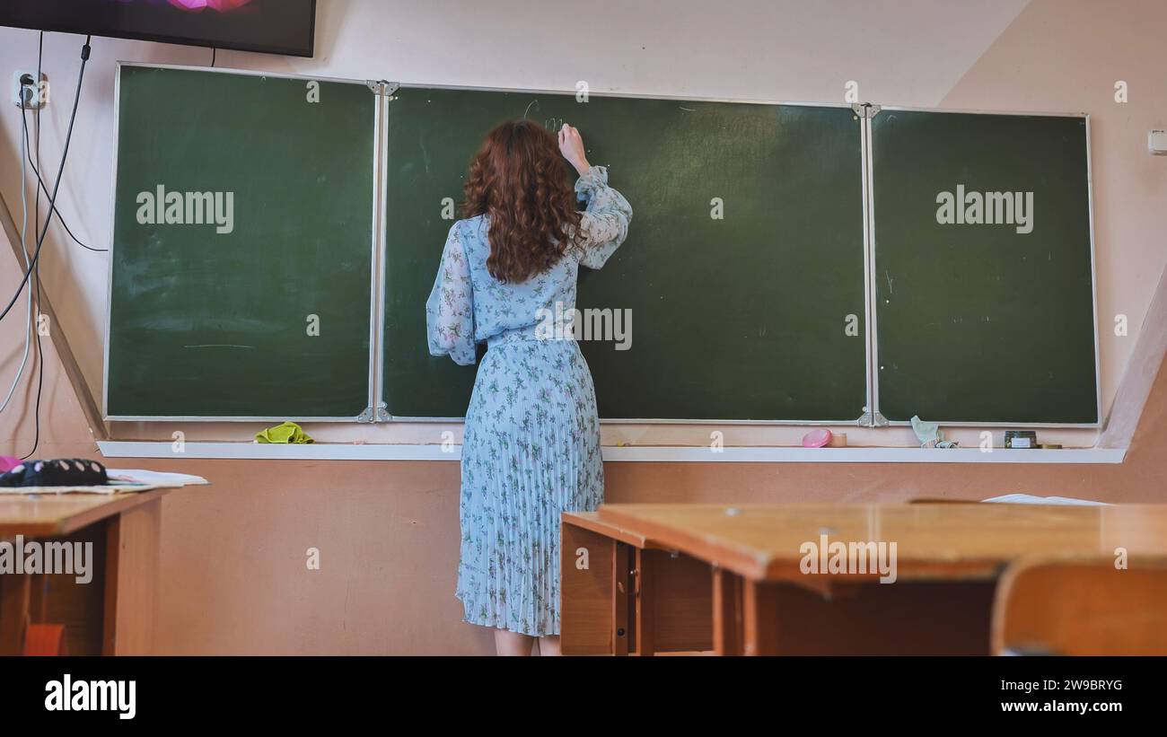 Teen student writes on the board hi-res stock photography and images ...