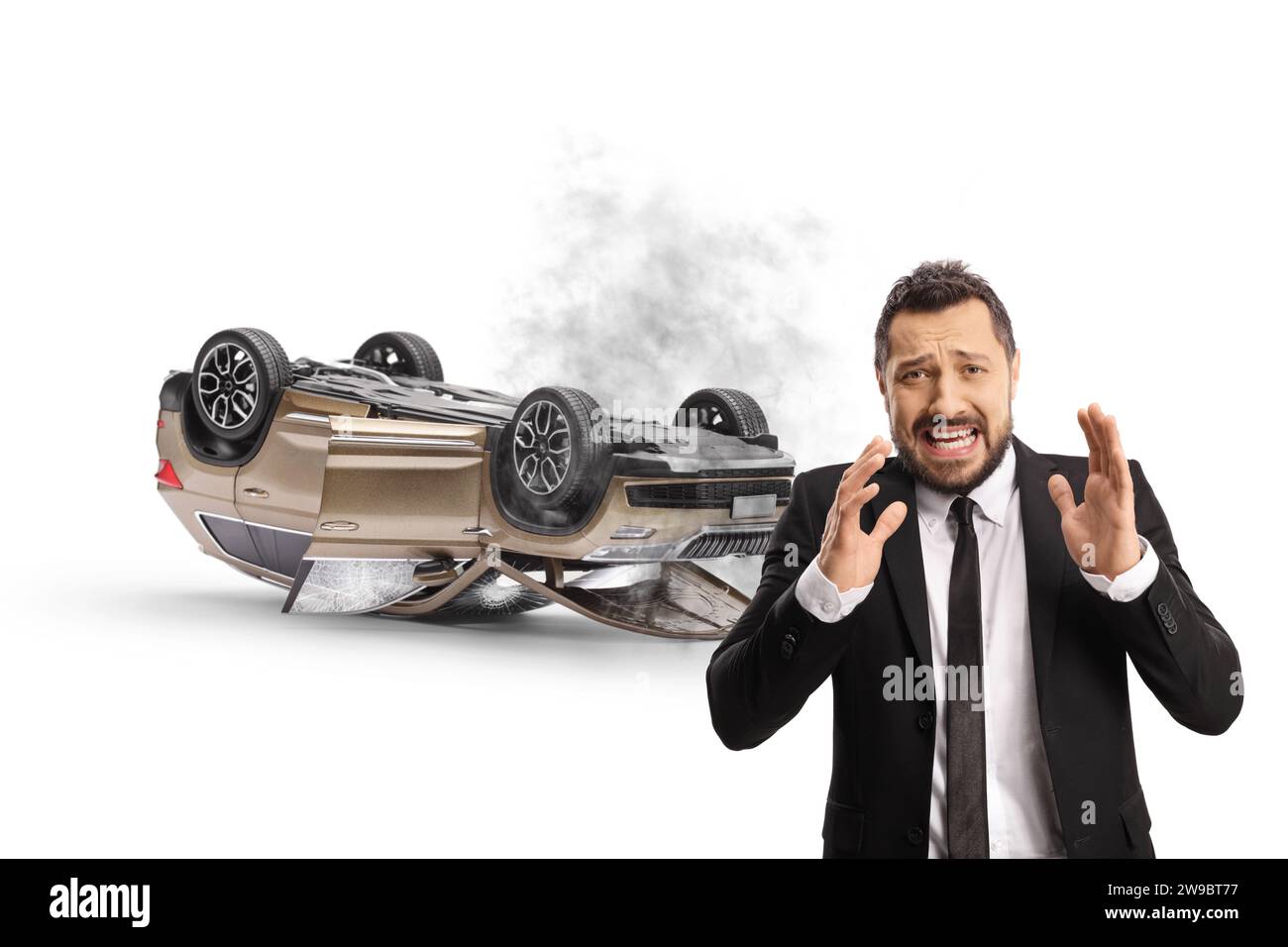 Scared man standing in front of a crashed SUV isolated on white ...