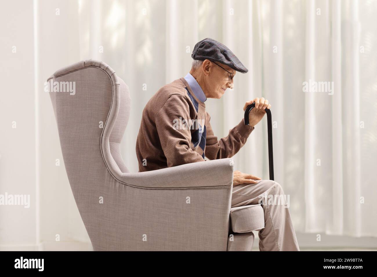 Lonely old man sitting in hi-res stock photography and images - Alamy
