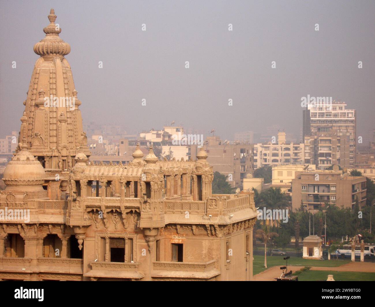 The Baron Empain Palace flanks buildings in the Heliopolis district of ...