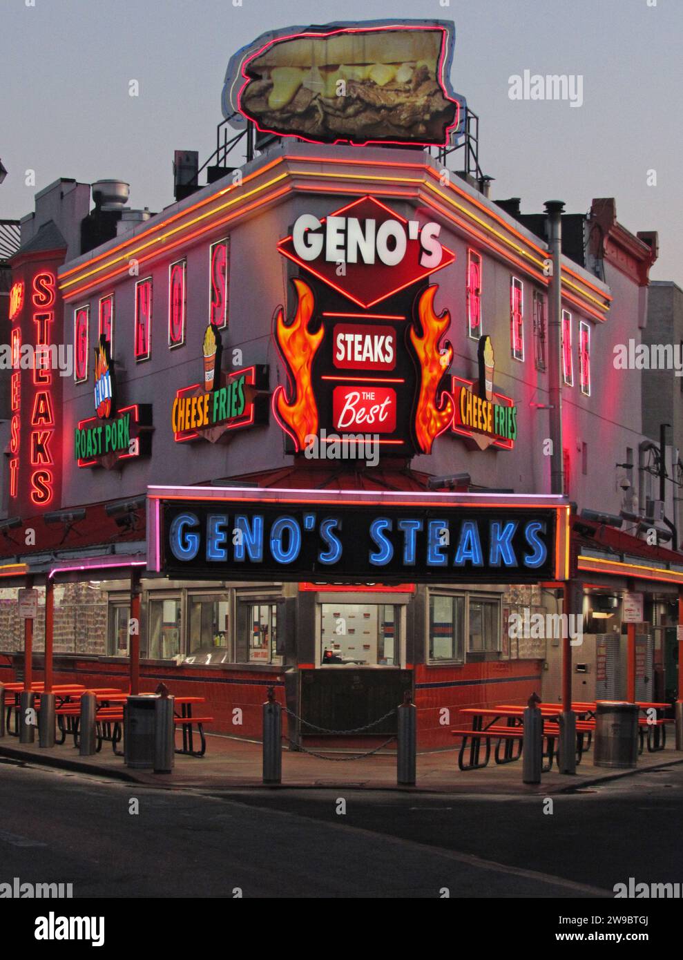 Geno's Steaks, a mainstay of Philadelphia's Italian Market, glows in ...