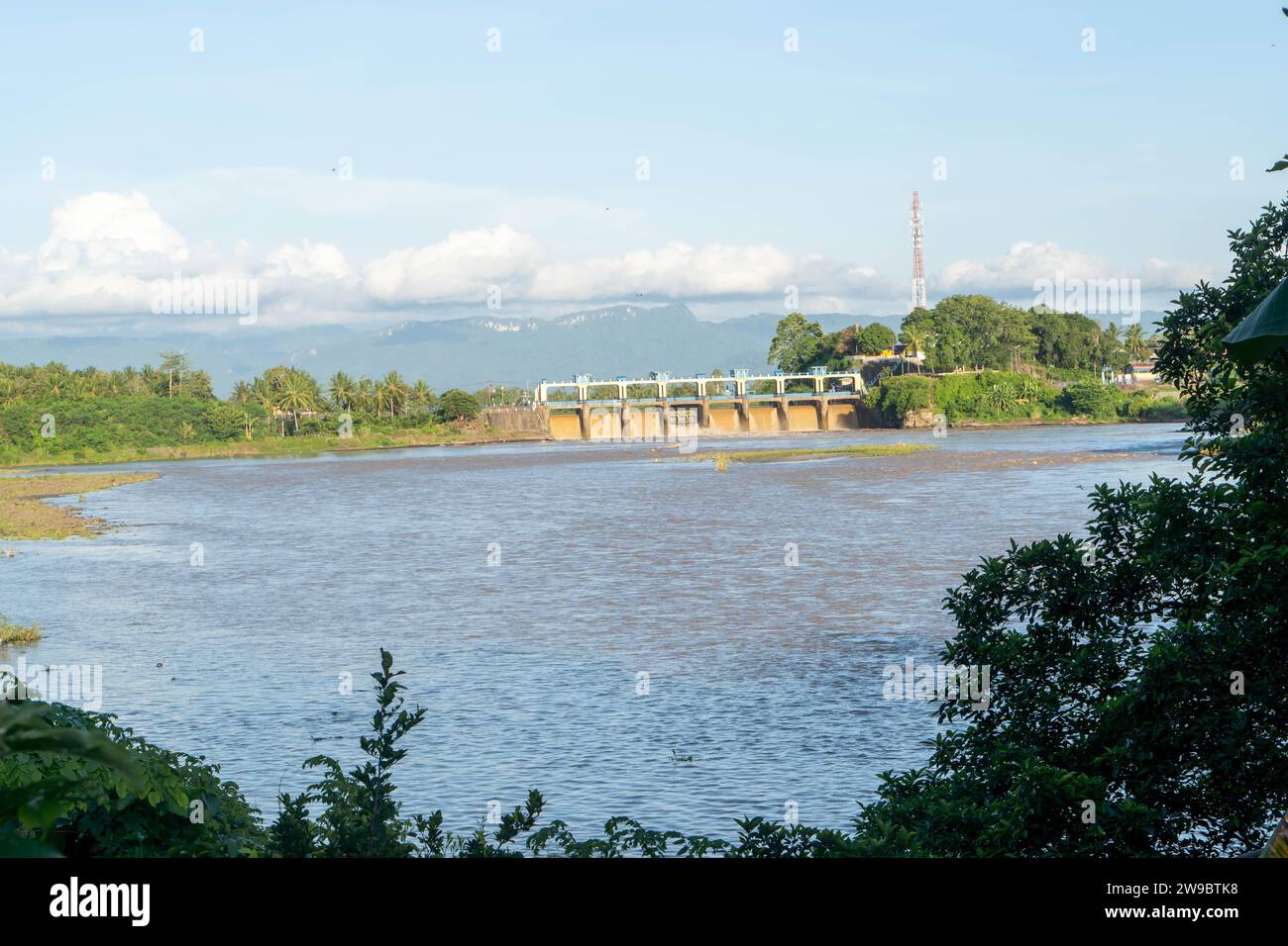 view of an irrigation dam, photographed from a distance, afternoon ...
