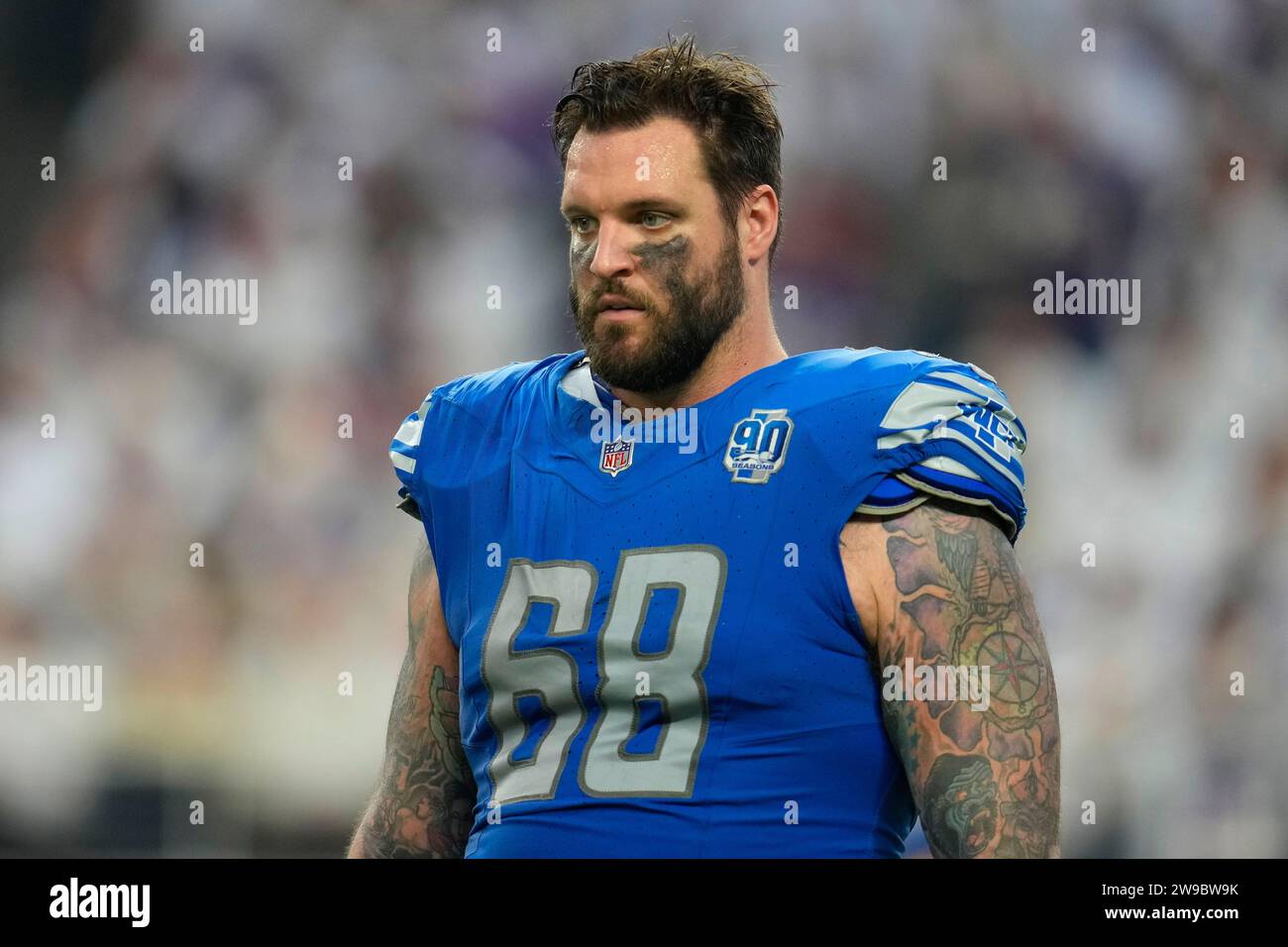 Detroit Lions offensive tackle Taylor Decker (68) walks on the field at ...