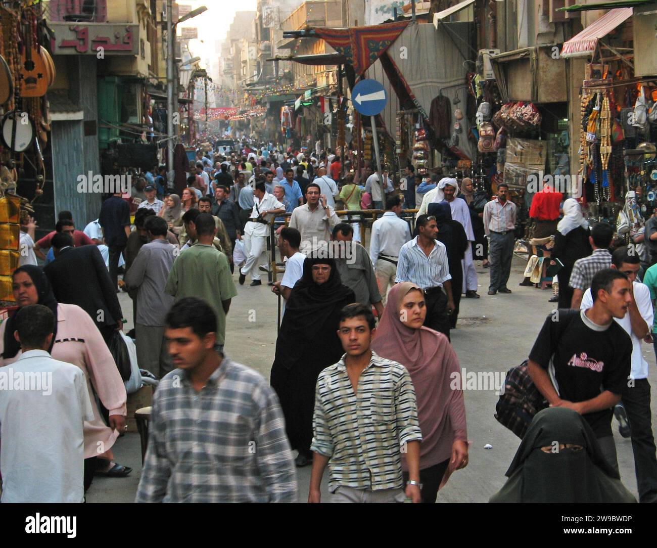 People crowd in the Khan el-Khalili market near Hussein Square in Cairo ...