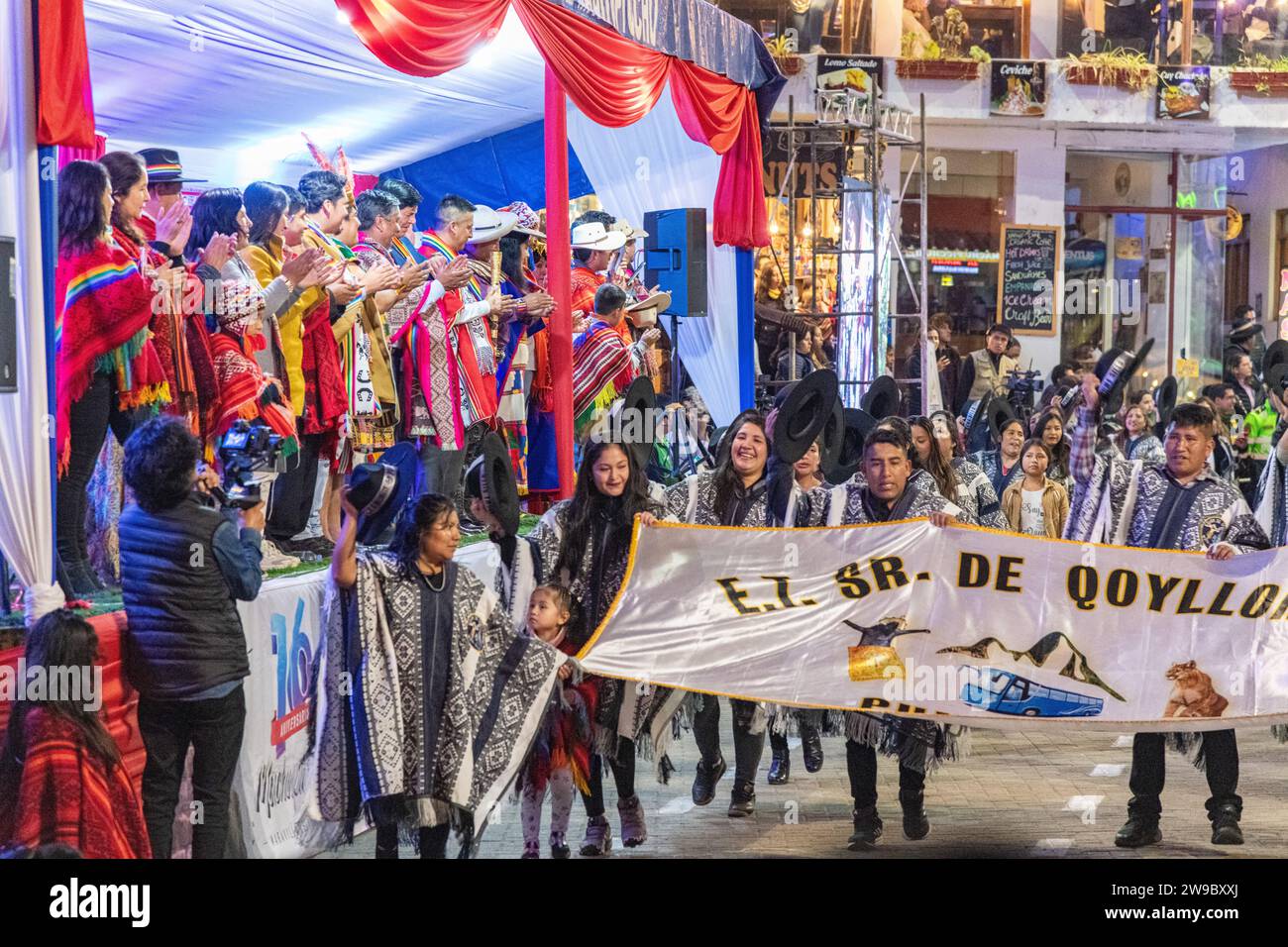 A ceremony procession in Aguas Calientes, Peru, celebrating the ...