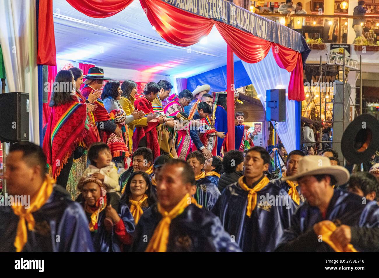 A ceremony procession in Aguas Calientes, Peru, celebrating the ...