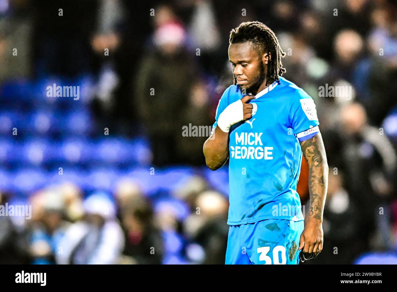 Peter Kioso (30 Peterborough United) looks down during the Sky Bet ...