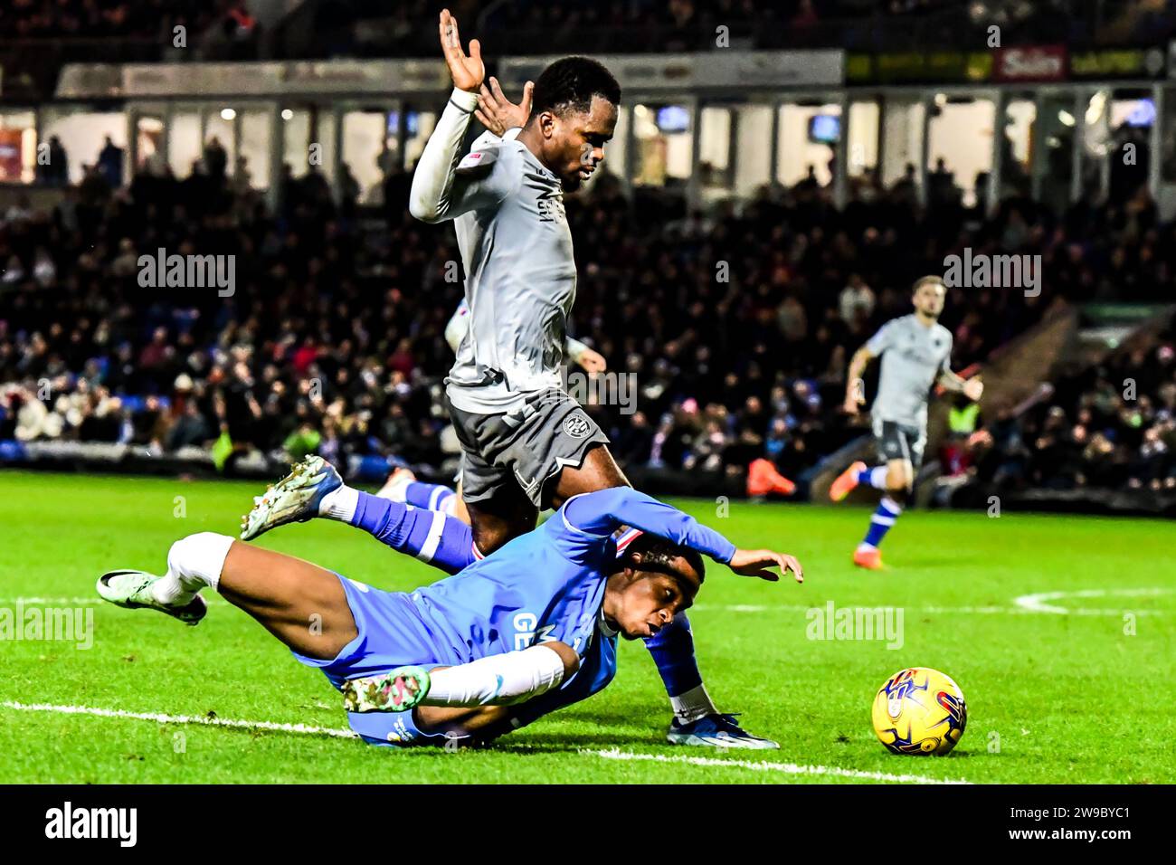 Oliver Norburn (18 Peterborough United) challenged by Nelson Abbey (32 ...