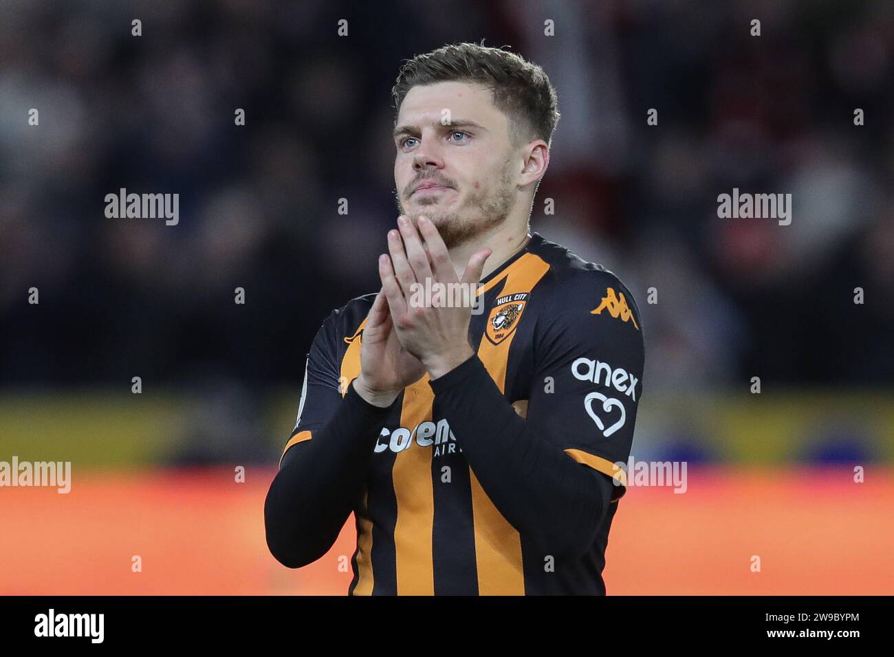 Regan Slater #27 of Hull City claps his hands and applauds the ...