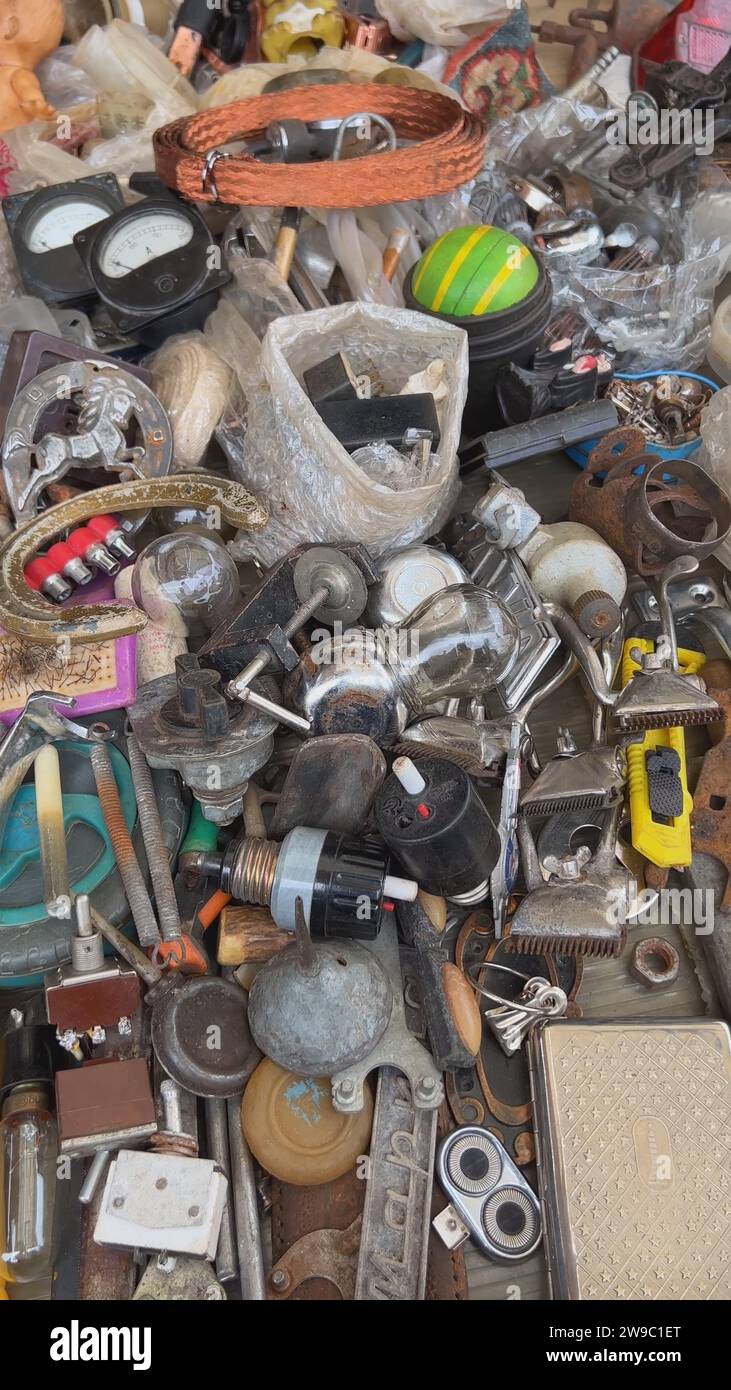 A flea market of old rusty things and tools Stock Photo - Alamy
