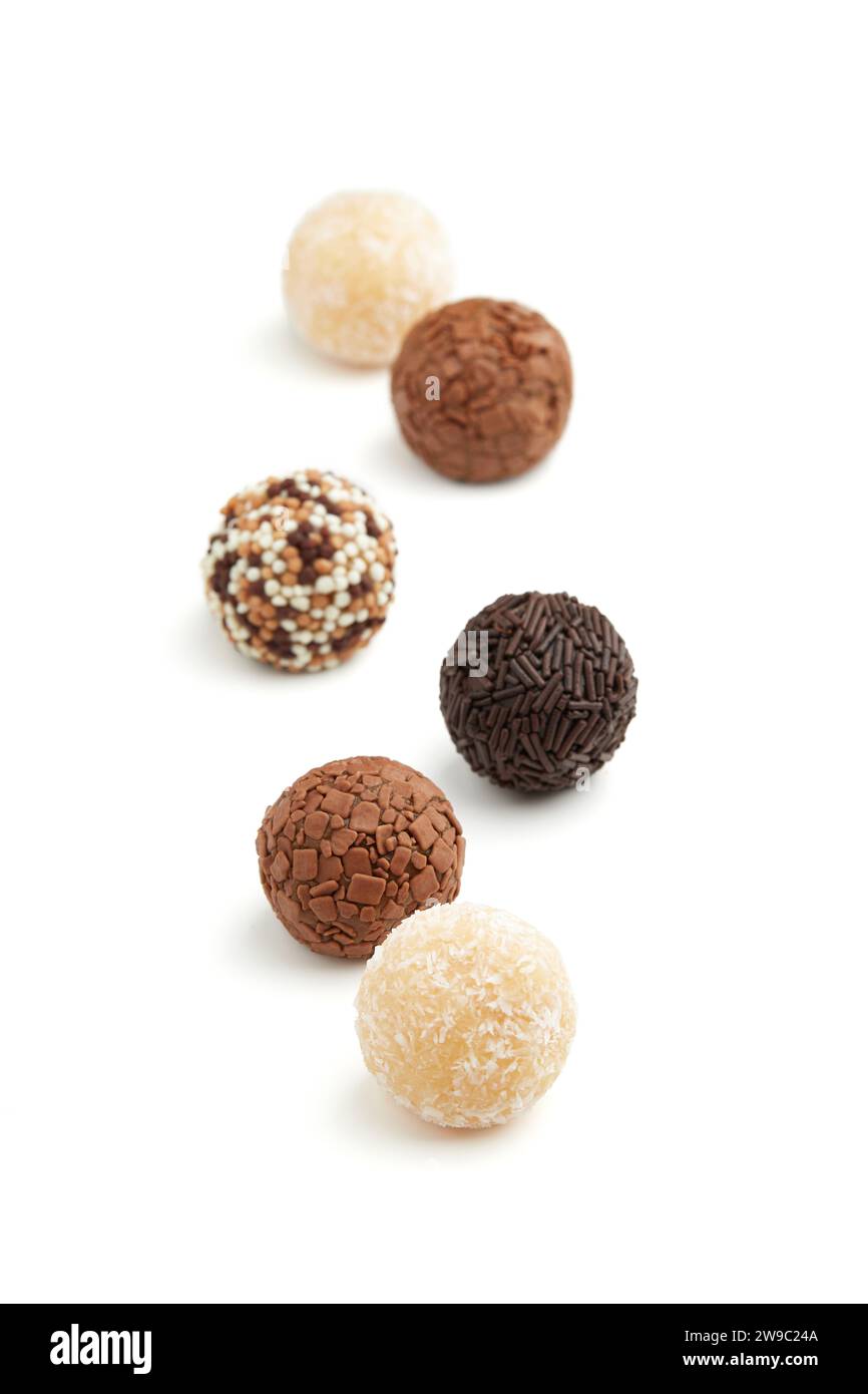 Typical Brazilian sweet brigadeiro. Assorted flavors of candies on a ...