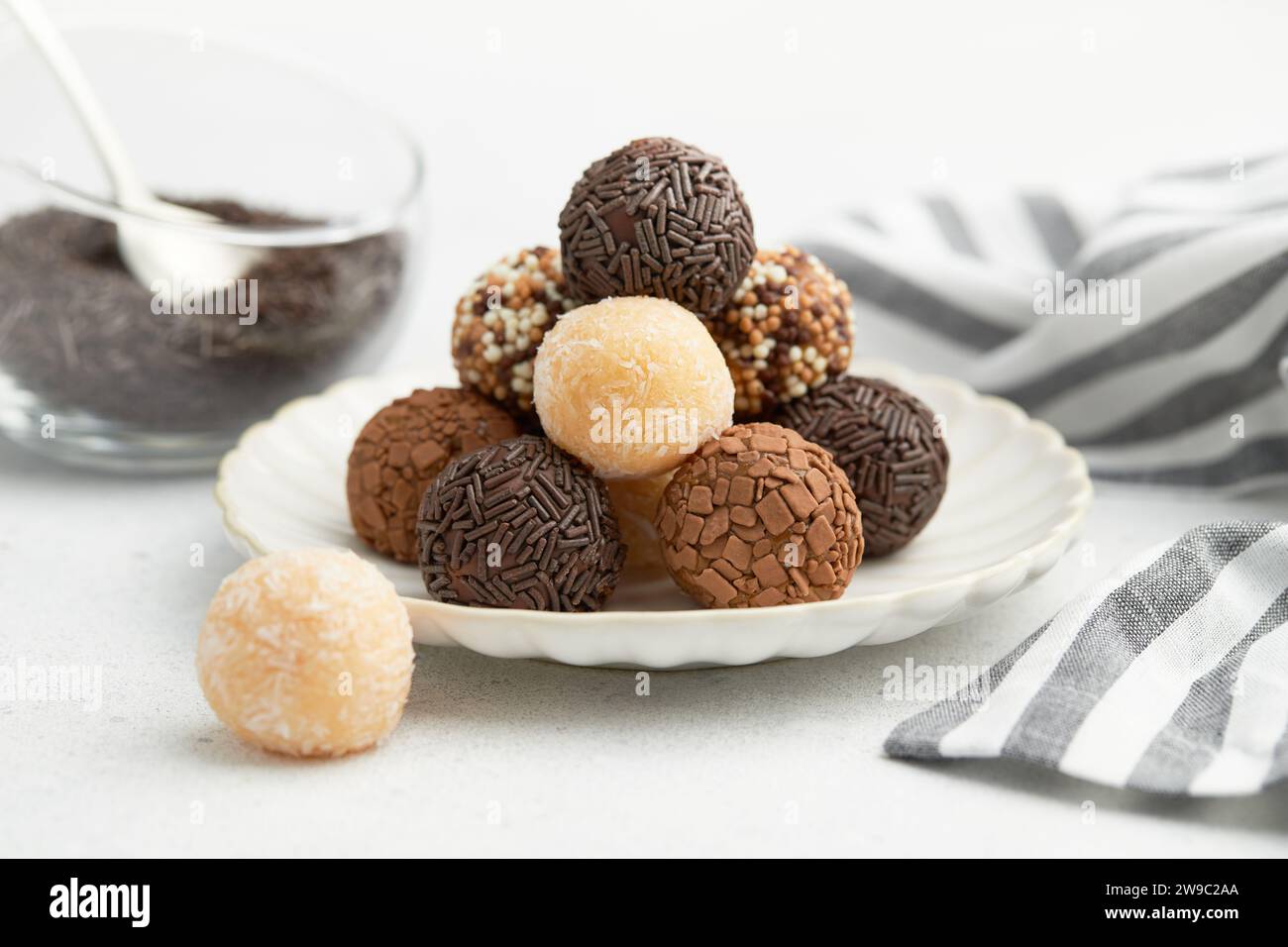 Typical Brazilian sweet brigadeiro. A heap of assorted flavors of ...