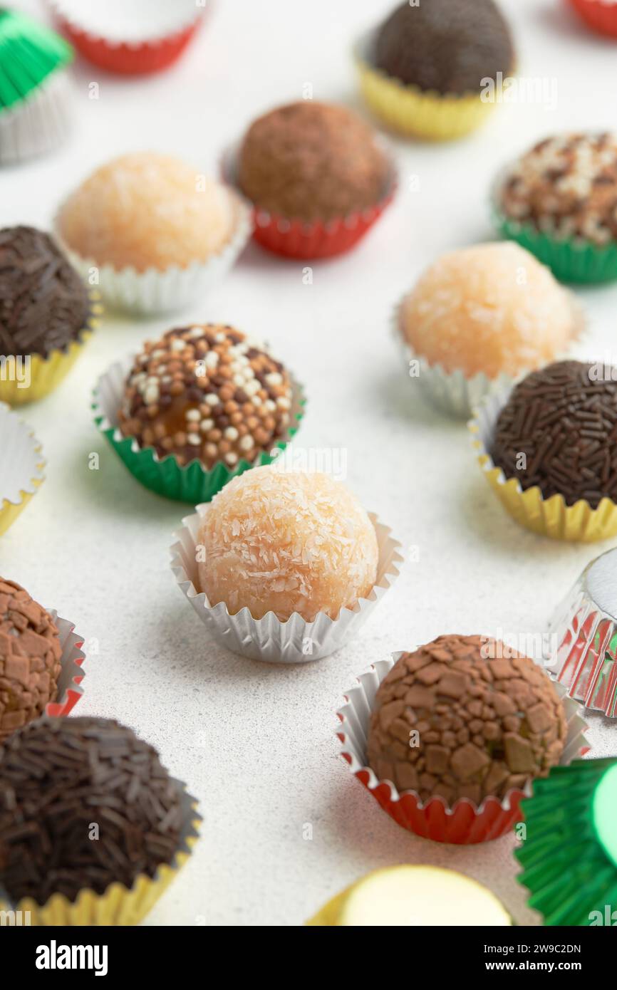 Typical Brazilian sweet brigadeiro. Assorted flavors of candies on a ...