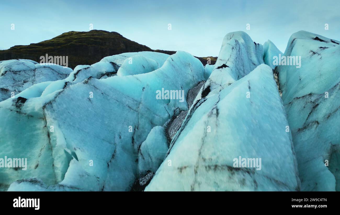 Aerial view of vatnajokull ice rocks floating on frozen lake, creating ...