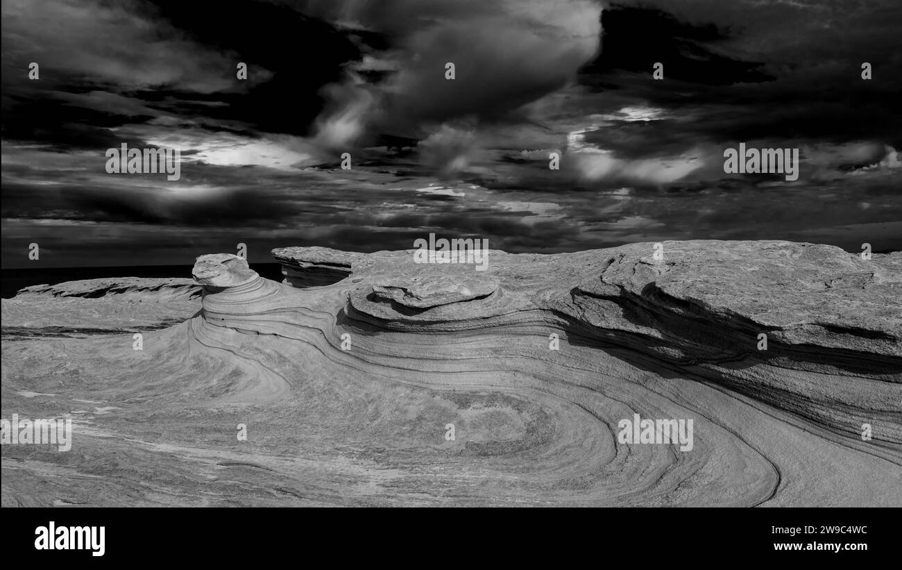 Sandstone weathering and clouds, Kamay National Park Australia Stock ...