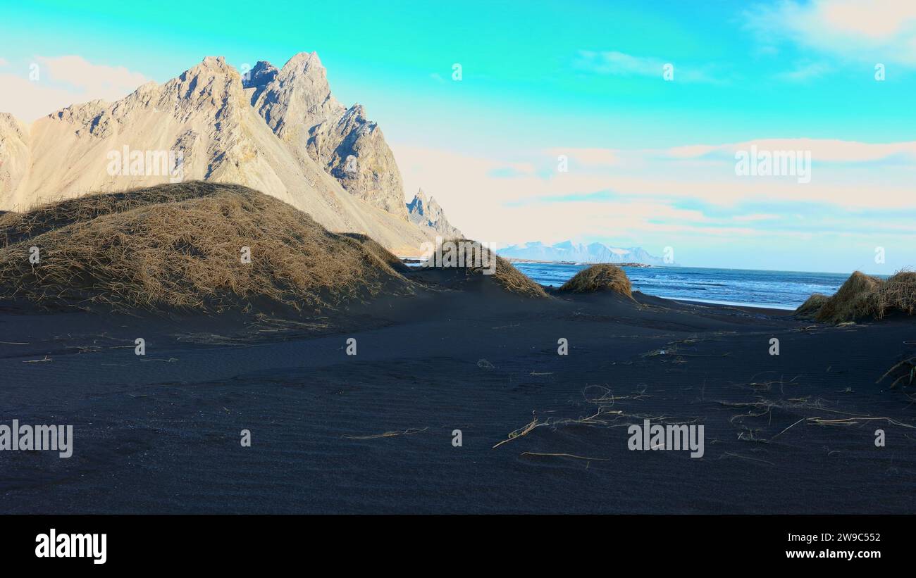 Icelandic stokksnes black sand beach with vestrahorn mountains creating ...