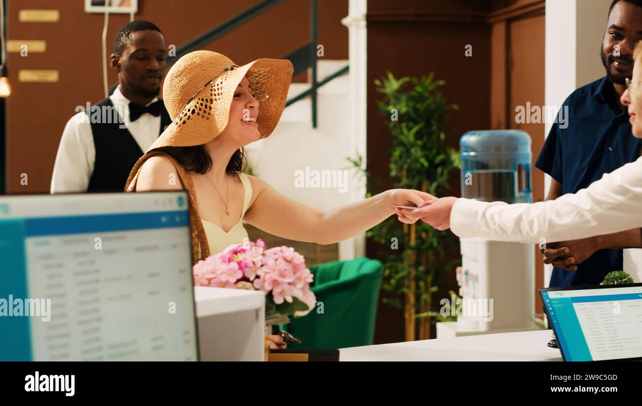 Tropical resort staff welcoming guest hi-res stock photography and ...