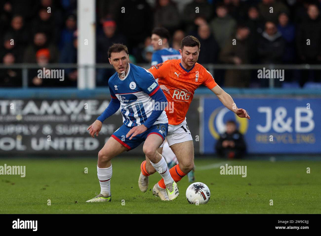 Hartlepool United's Callum Cooke in action with Nathan Sheron of Oldham ...