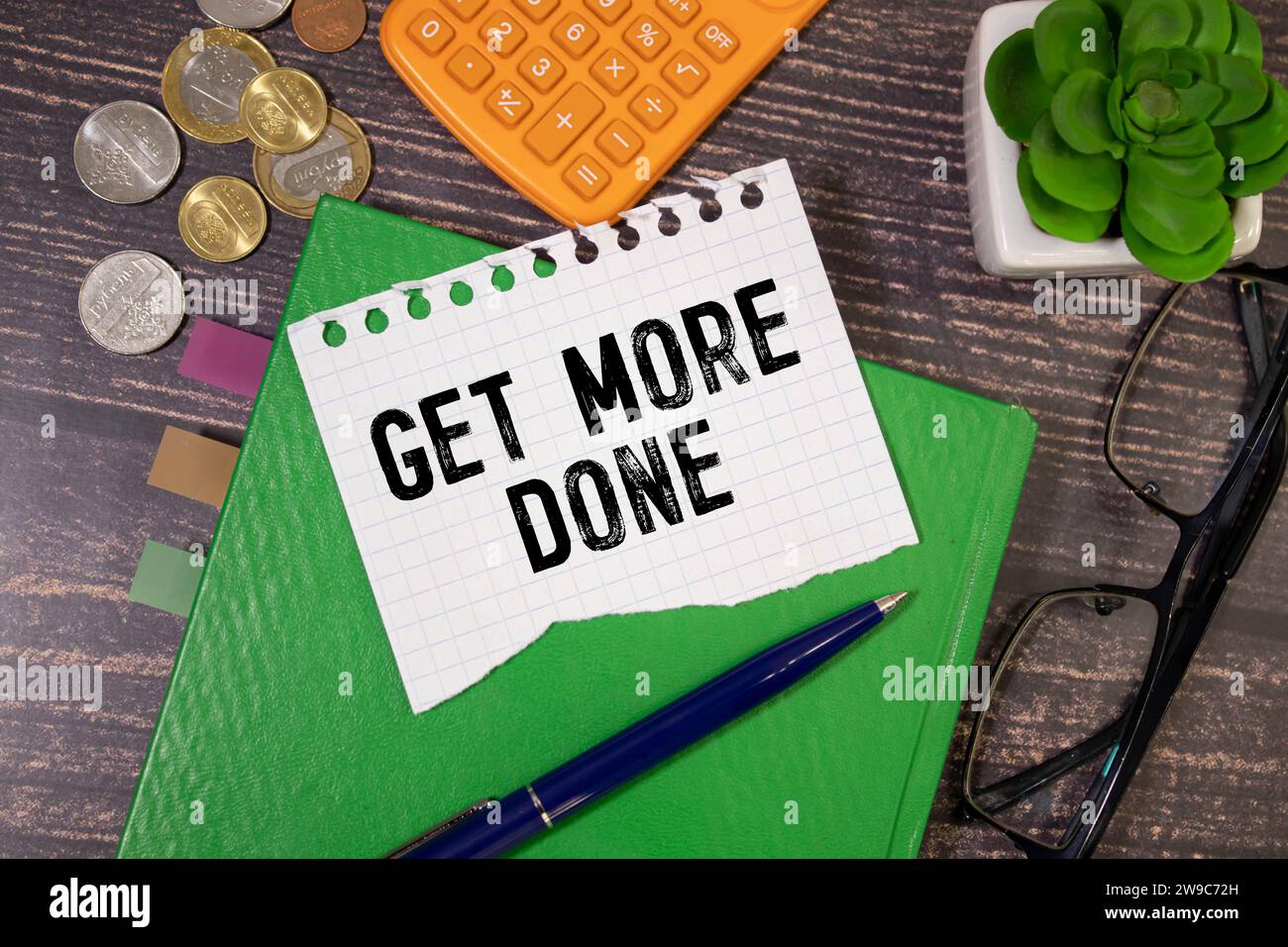 Get More Done Text written on notebook page, red pencil on the right ...