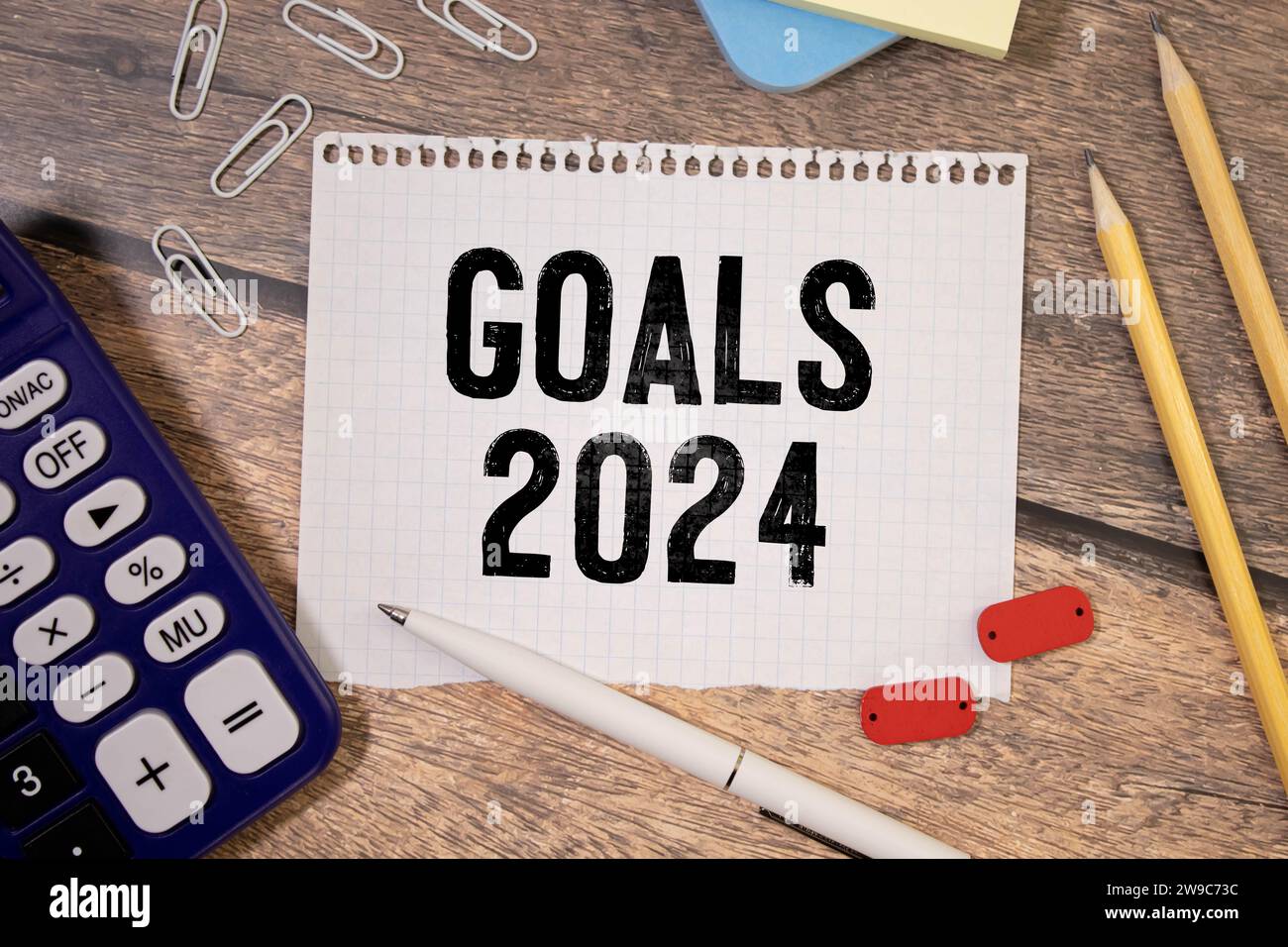 New year resolutions 2024 on desk. 2024 goals list with notebook ...