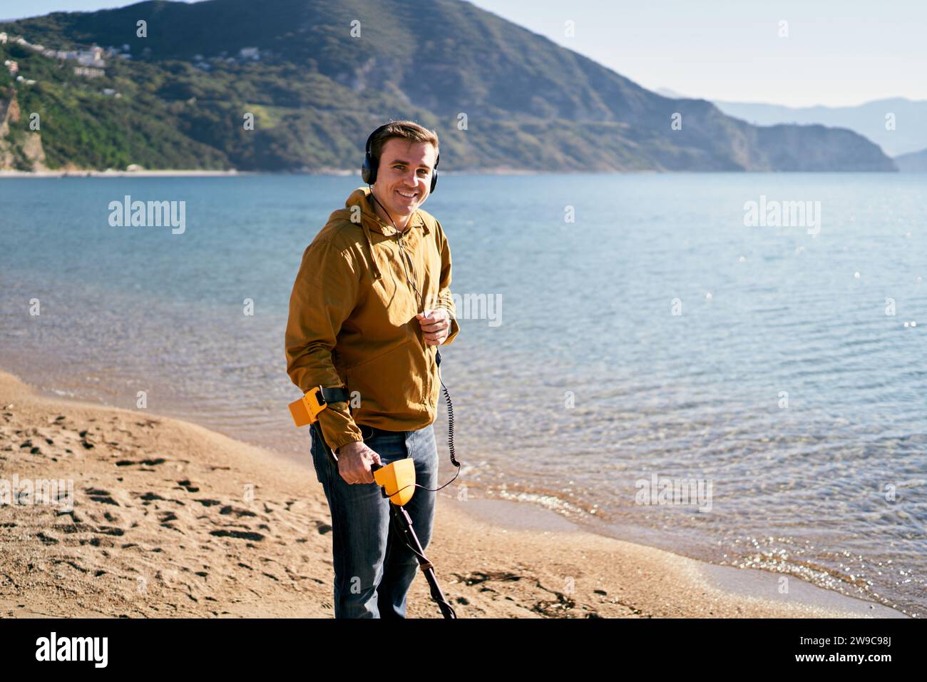 Man walks along beach metal hi-res stock photography and images - Alamy