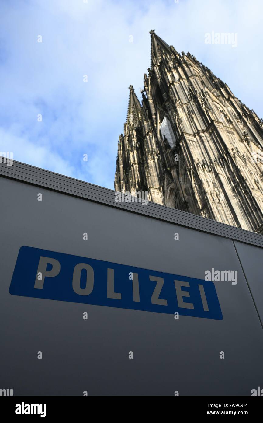 Cologne, Germany. 26th Dec, 2023. POLIZEI lettering on a vehicle parked ...